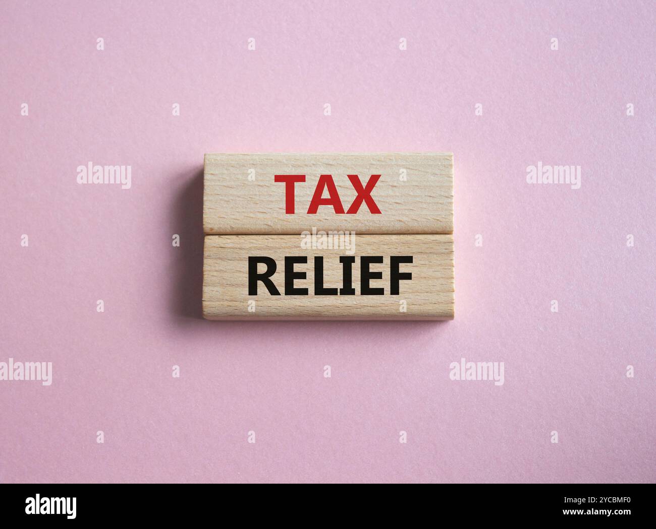 Tax Relief symbol. Concept word Tax Relief on wooden blocks. Beautiful ...