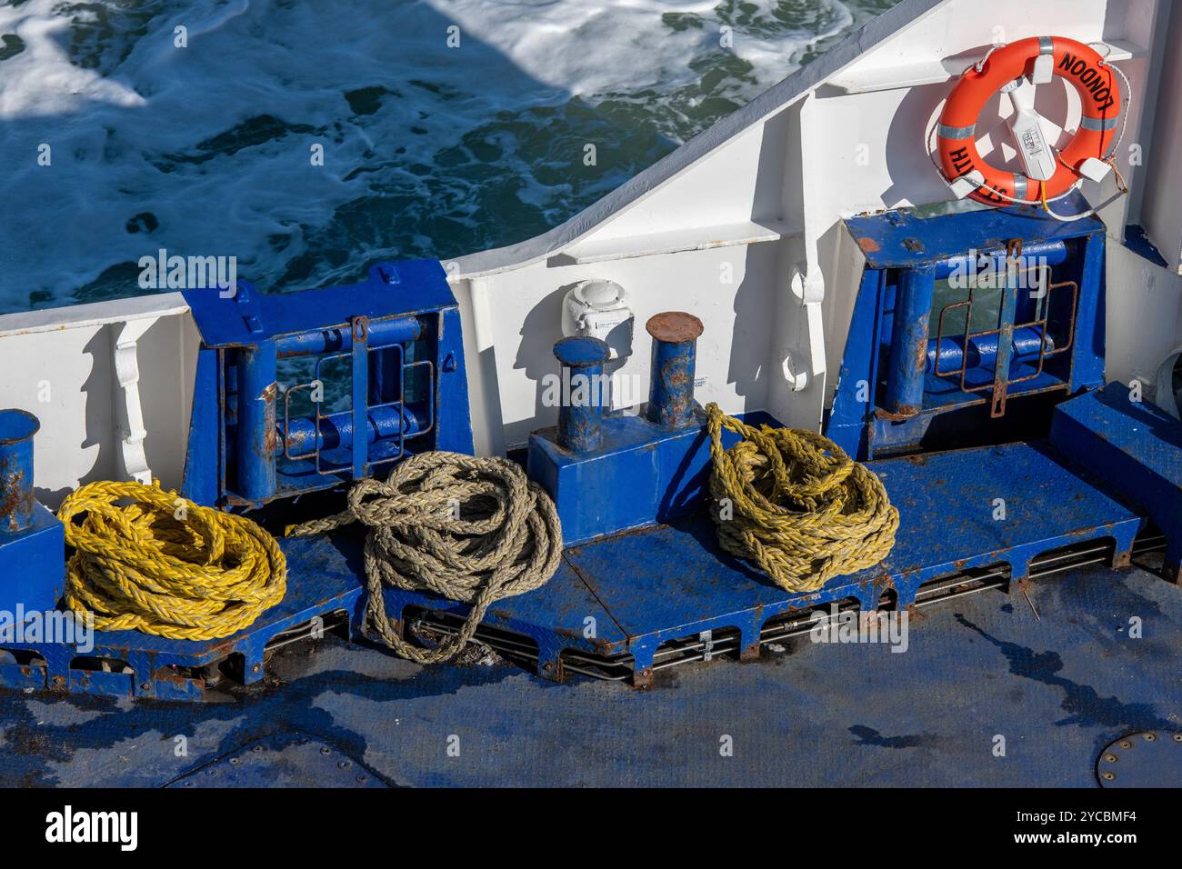 coiled ropes and roller fairleads on the deck of a Wightlink Isle of ...