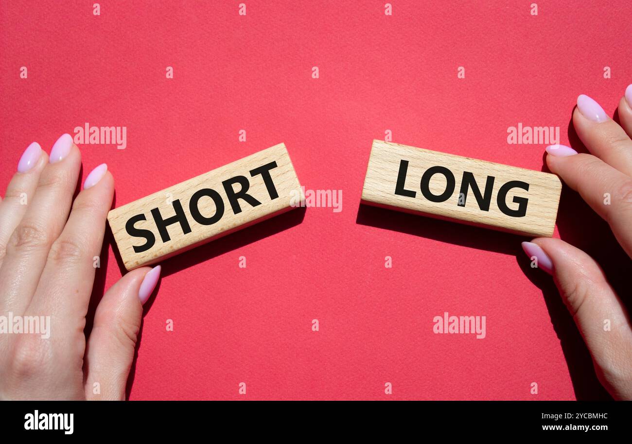 Short vs Long symbol. Concept word Short vs Long on wooden blocks ...