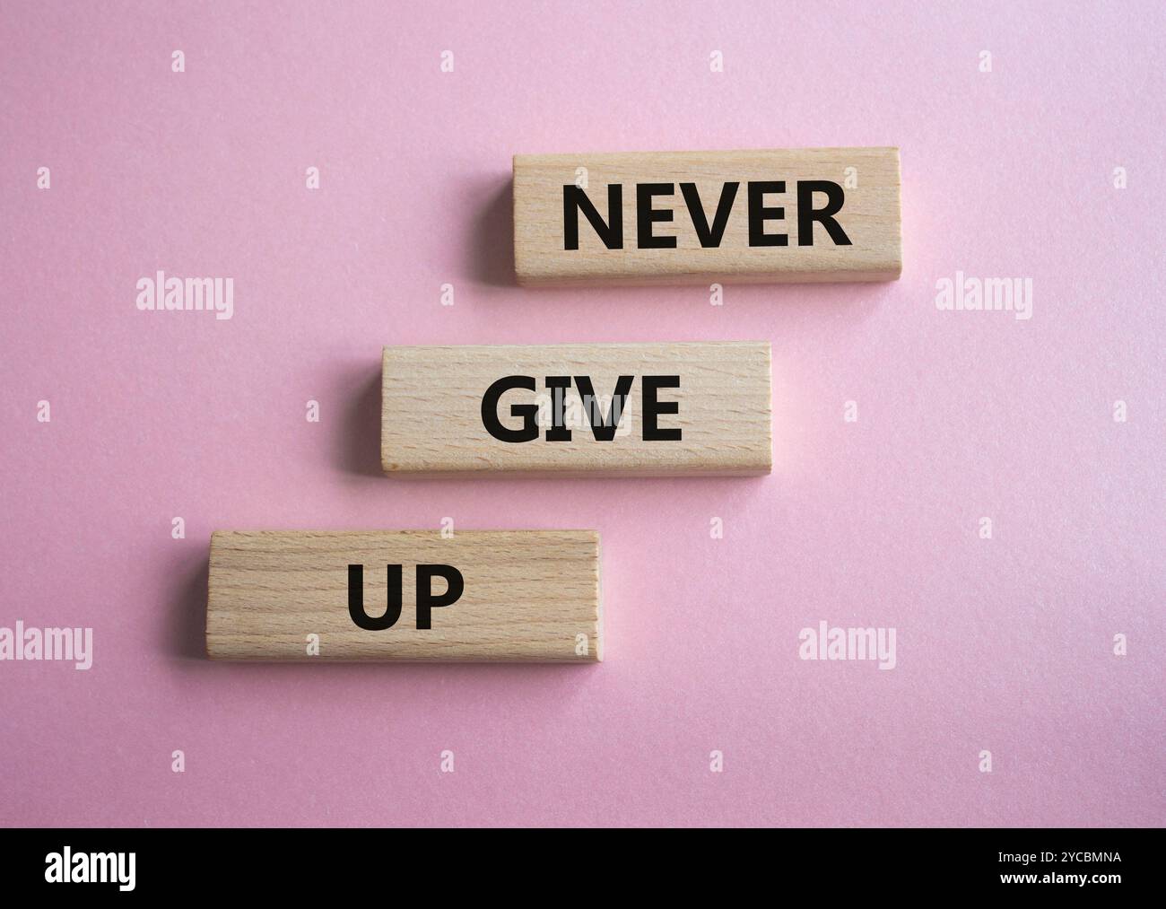 Never give up symbol. Concept words Never give up on wooden blocks ...