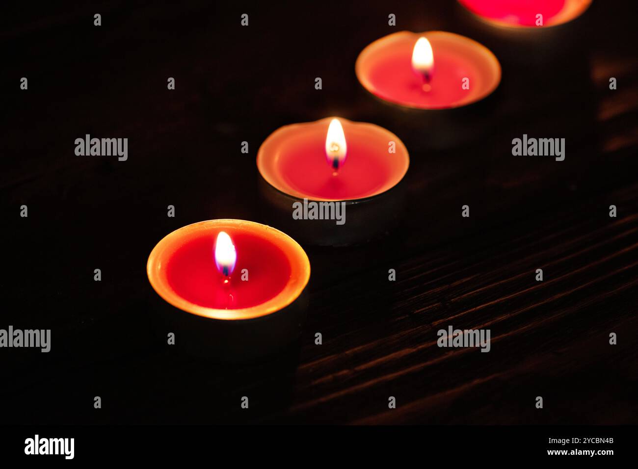Romantic candlelight love on dark backdrop Stock Photo - Alamy