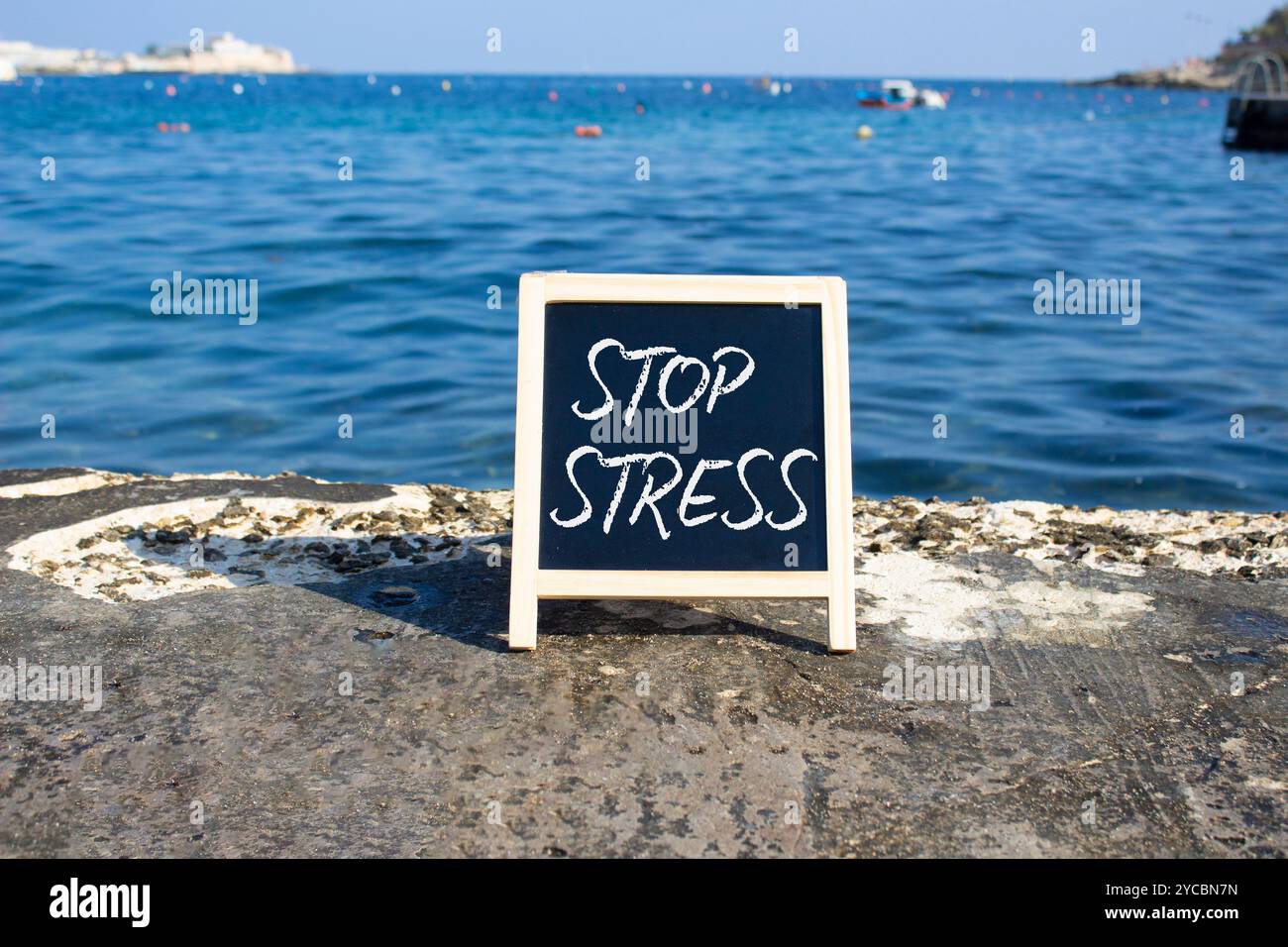 Stop Stress symbol. Concept words Stop Stress on black chalk background ...