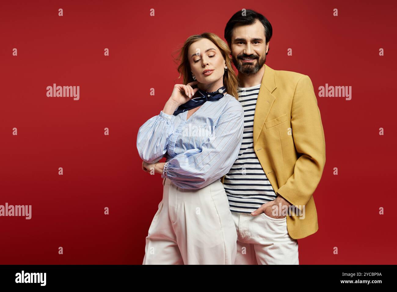 A middle aged couple shows off their style in chic outfits with a bold ...