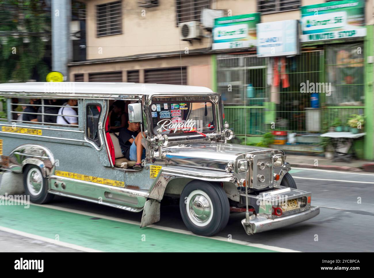 Manila,Philippines-January 13 2023:The colorful,rustic vehicles rush ...