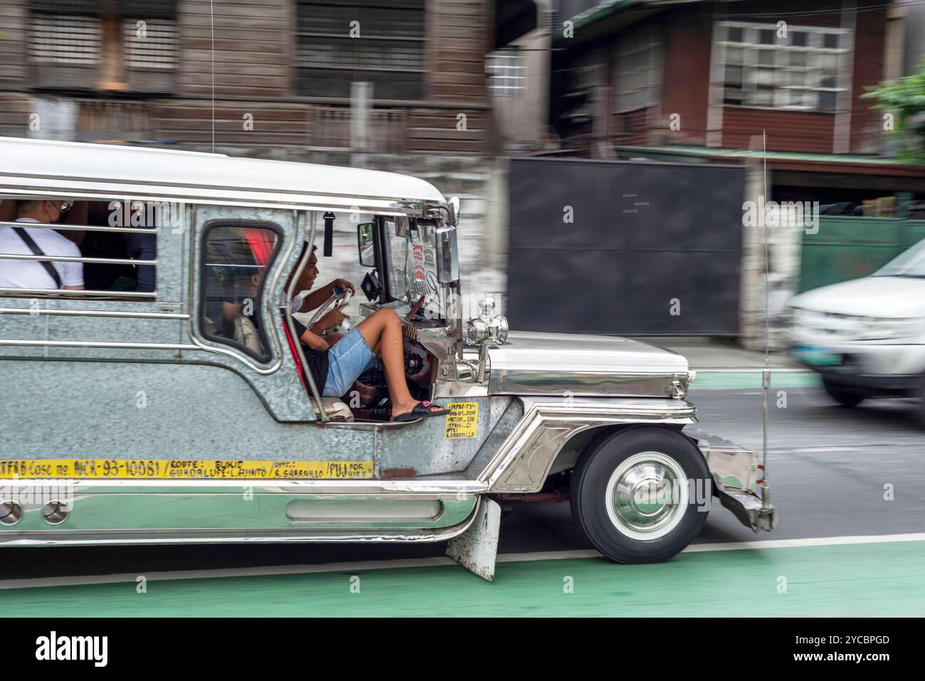 Manila,Philippines-January 13 2023:The colorful,rustic vehicles rush ...