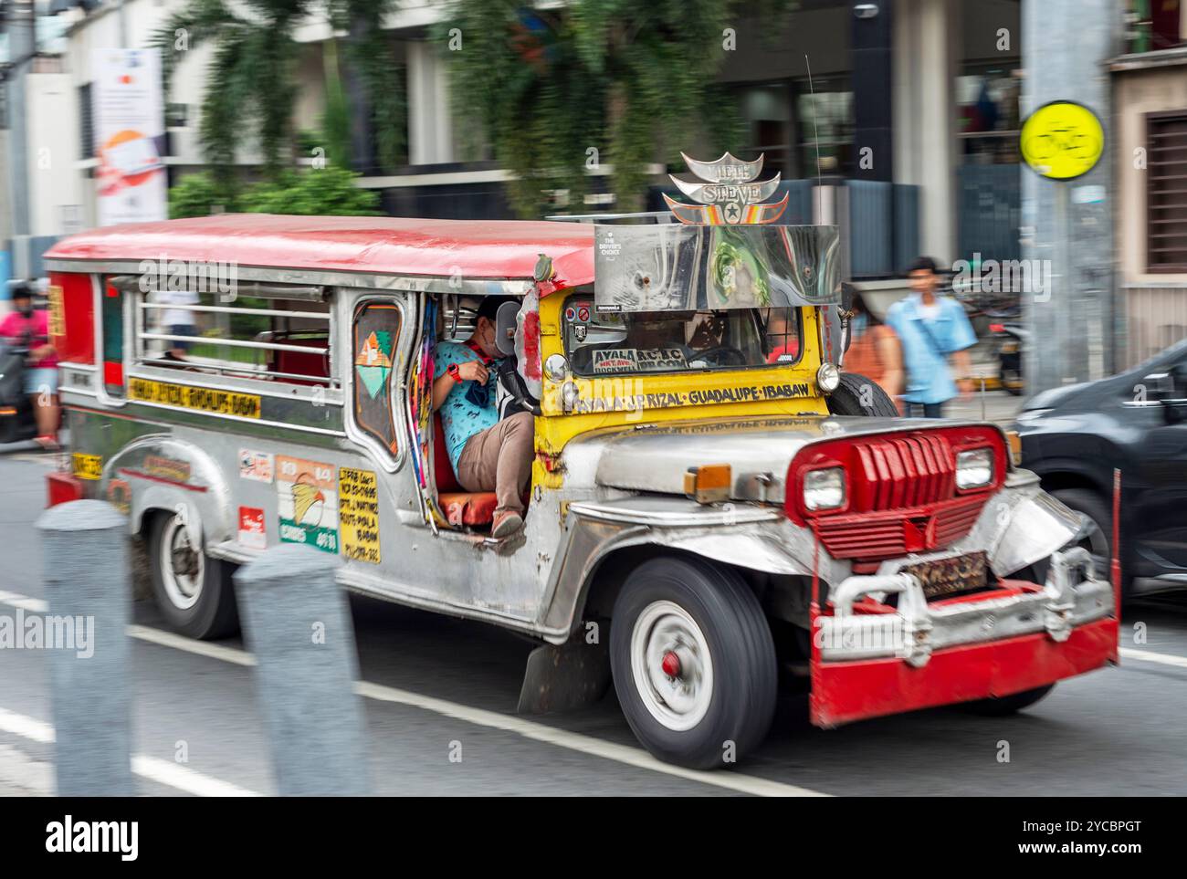 Manila,Philippines-January 13 2023:The colorful,rustic vehicles rush ...