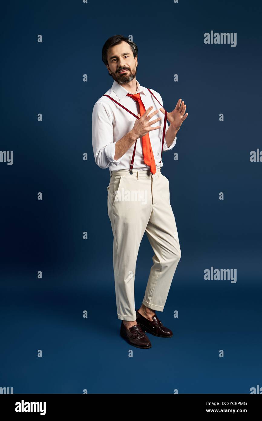 The man gestures expressively while showcasing a unique fashion choice ...