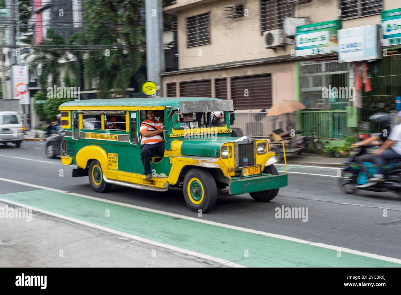 Manila,Philippines-January 13 2023:The colorful,rustic vehicles rush ...