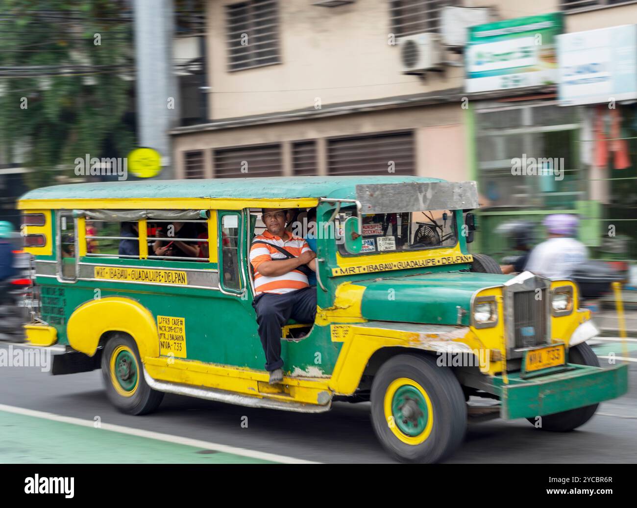 Manila,Philippines-January 13 2023:The colorful,rustic vehicles rush ...