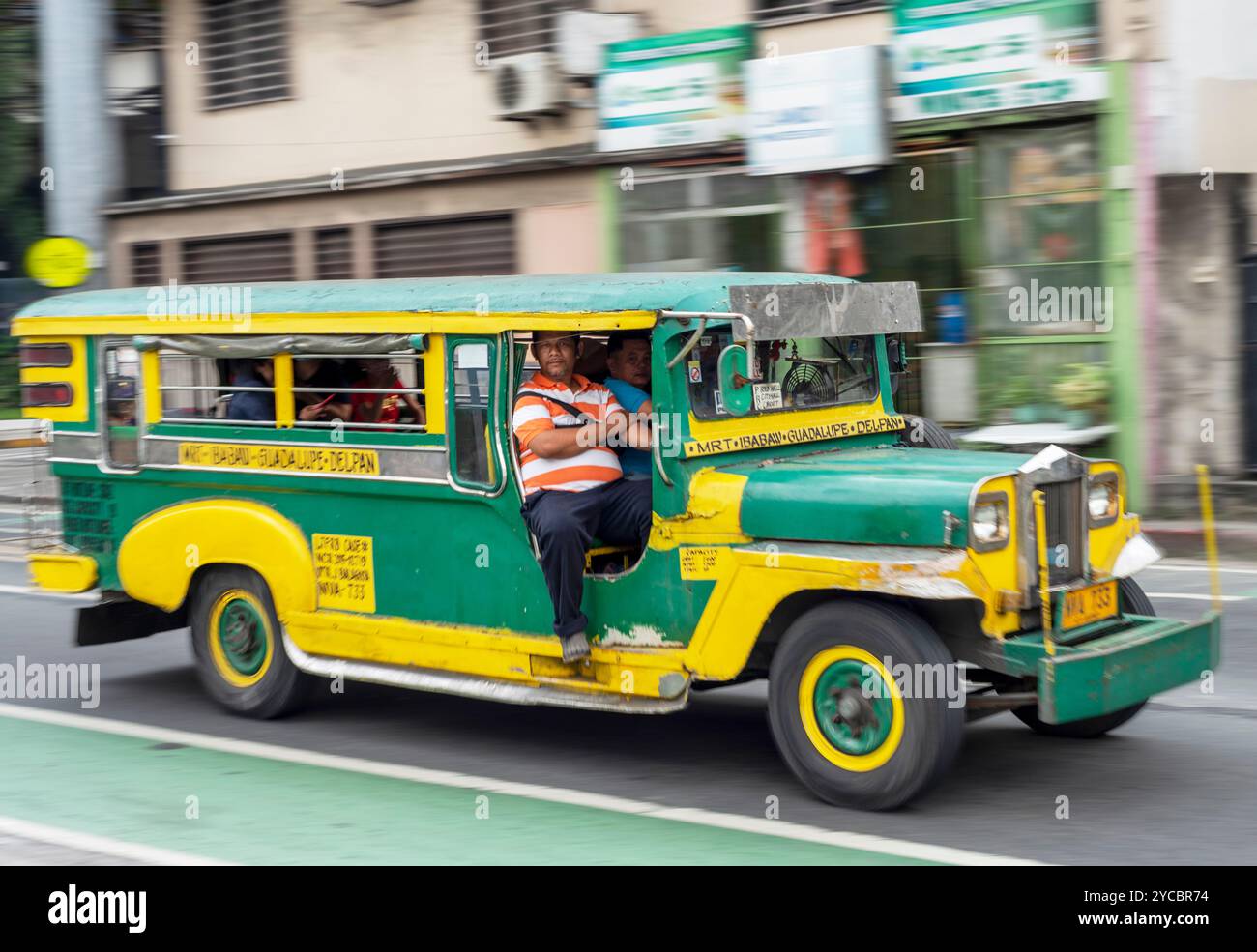Manila,Philippines-January 13 2023:The colorful,rustic vehicles rush ...