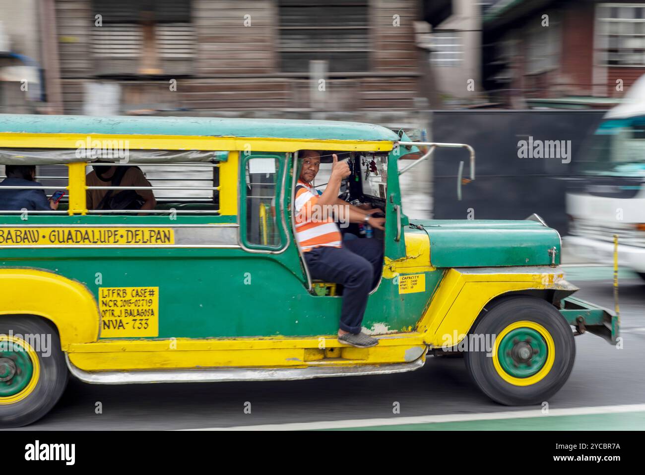 Manila,Philippines-January 13 2023:The colorful,rustic vehicles rush ...