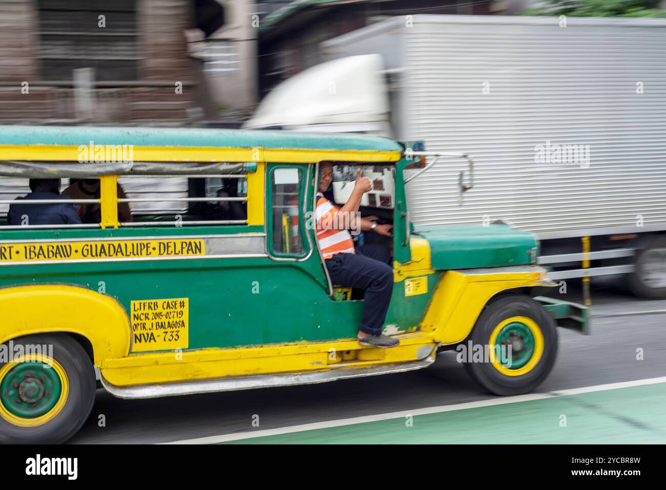 Manila,Philippines-January 13 2023:The colorful,rustic vehicles rush ...