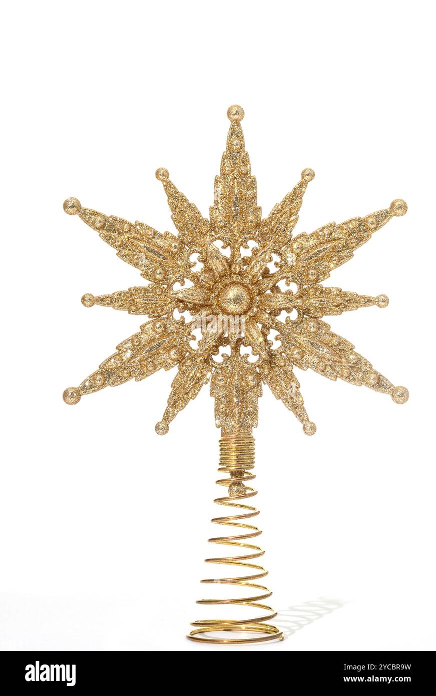 Golden glitter tree topper star on white background Stock Photo - Alamy