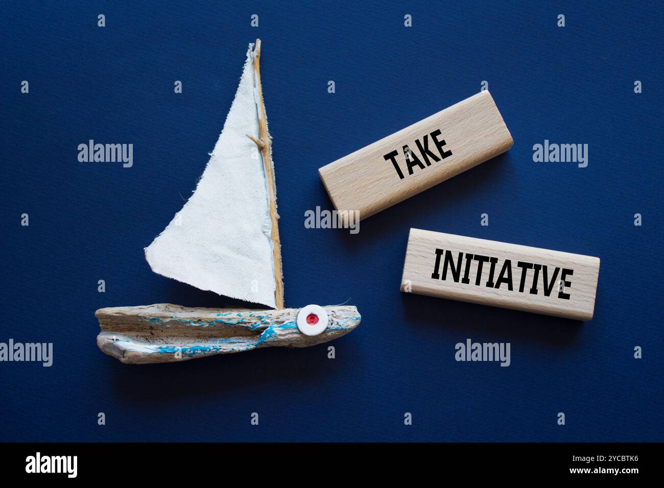 Take initiative symbol. Wooden blocks with words Take initiative ...