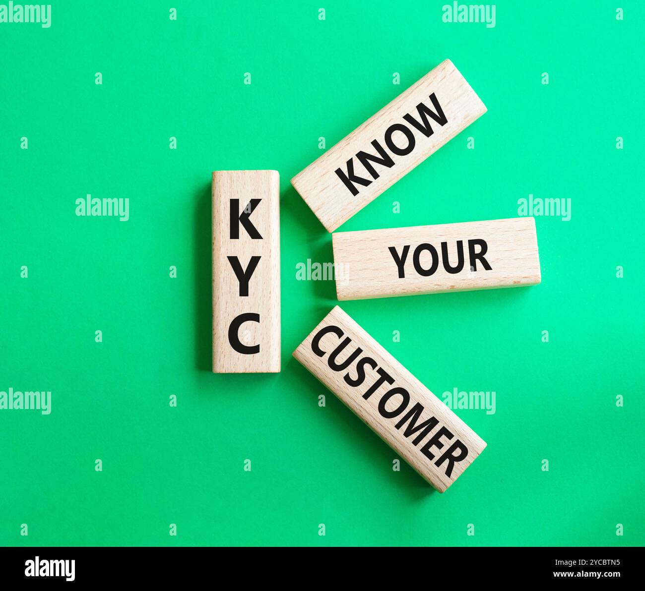 KYC - Know Your Customer. Wooden cubes with word KYC. Beautiful green ... KYC - Know Your Customer. Wooden cubes with word KYC. Beautiful green ...