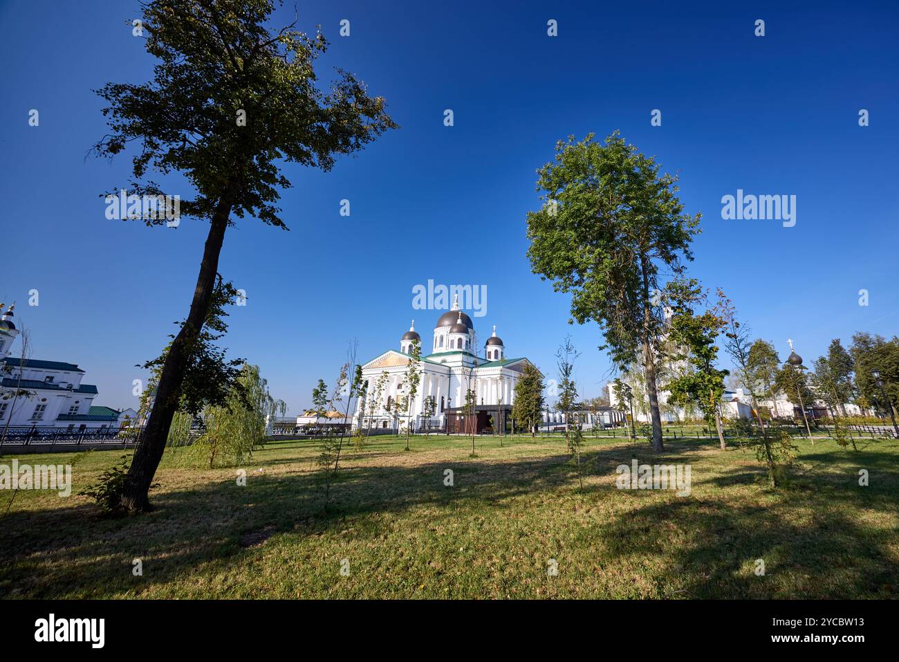 Majestic cathedral with domes against blue sky in Arzamas, surrounded ...