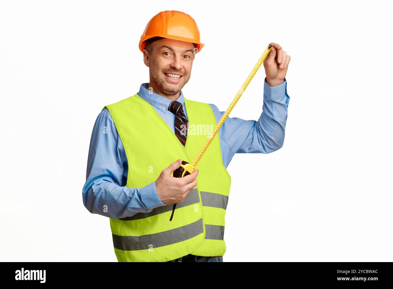 Builder Workman Posing With Tape-Measure Smiling To Camera, White ...