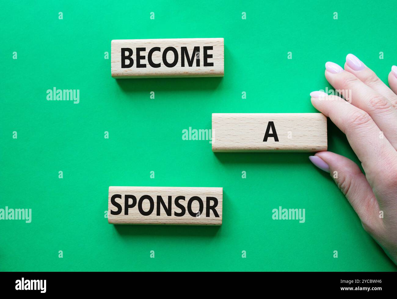 Become a sponsor symbol. Concept word Become a sponsor on wooden blocks ...