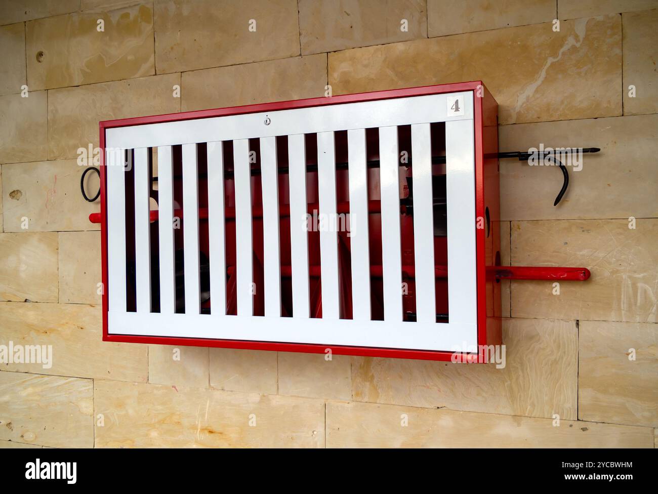 Fire extinguisher hanging on wall hi-res stock photography and images ...