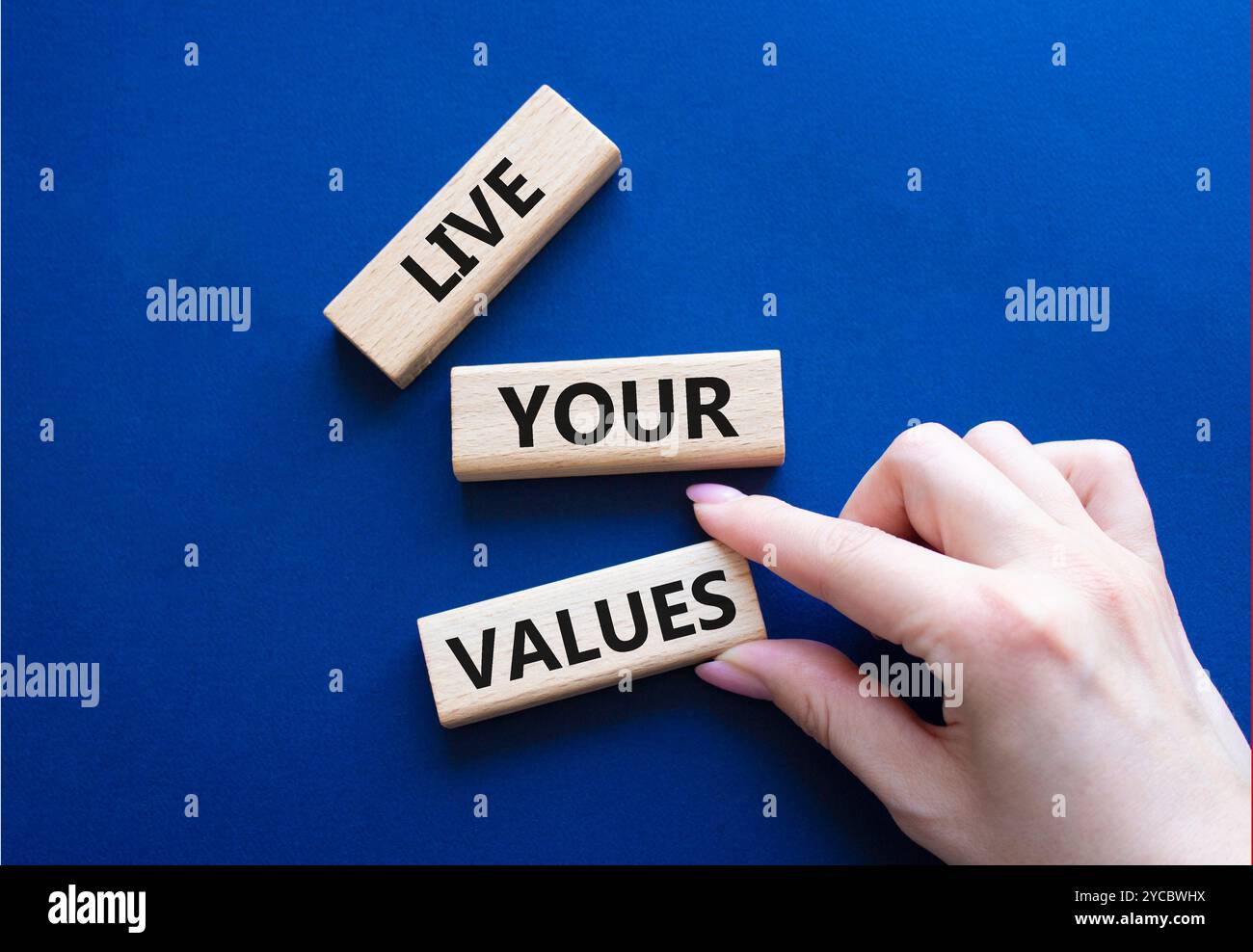 Live your values symbol. Concept words Live your values on wooden ...