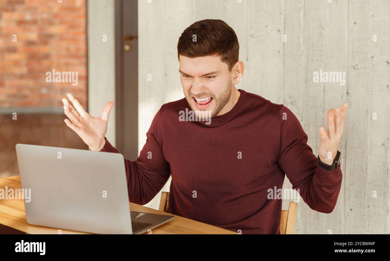 Angry Office Worker Shouting Sitting At Laptop At Workplace Indoor ...