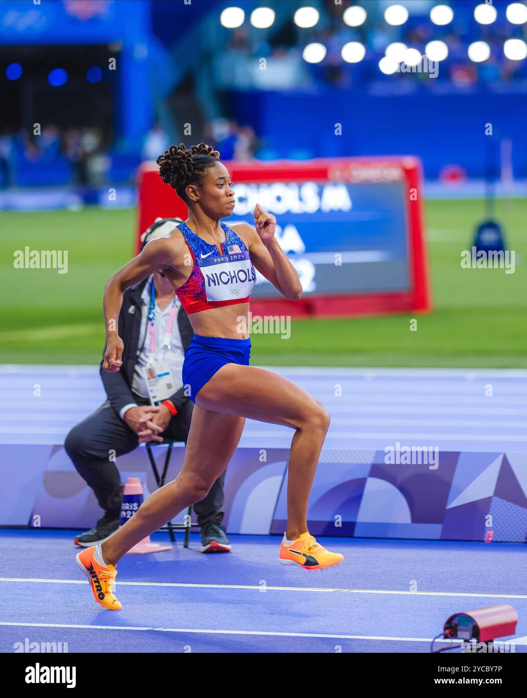 Monae' Nichols participating in the long jump at the Paris 2024 Olympic ...