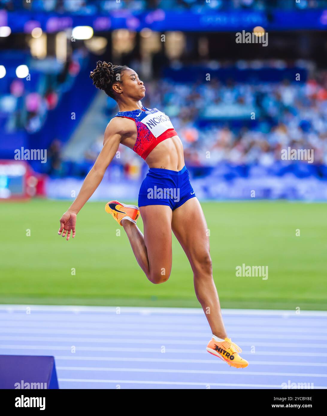 Monae' Nichols participating in the long jump at the Paris 2024 Olympic ...