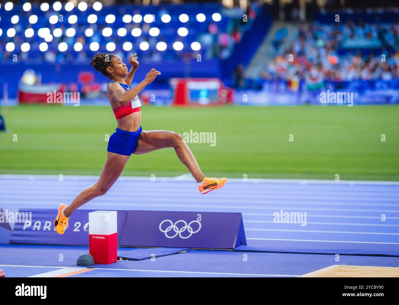 Monae' Nichols participating in the long jump at the Paris 2024 Olympic ...