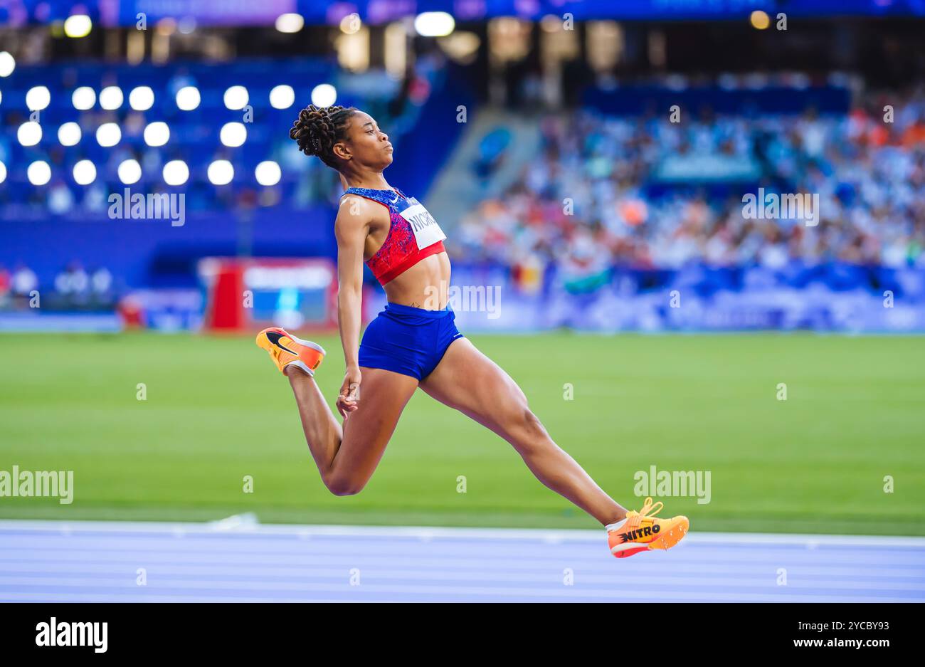 Monae' Nichols participating in the long jump at the Paris 2024 Olympic ...