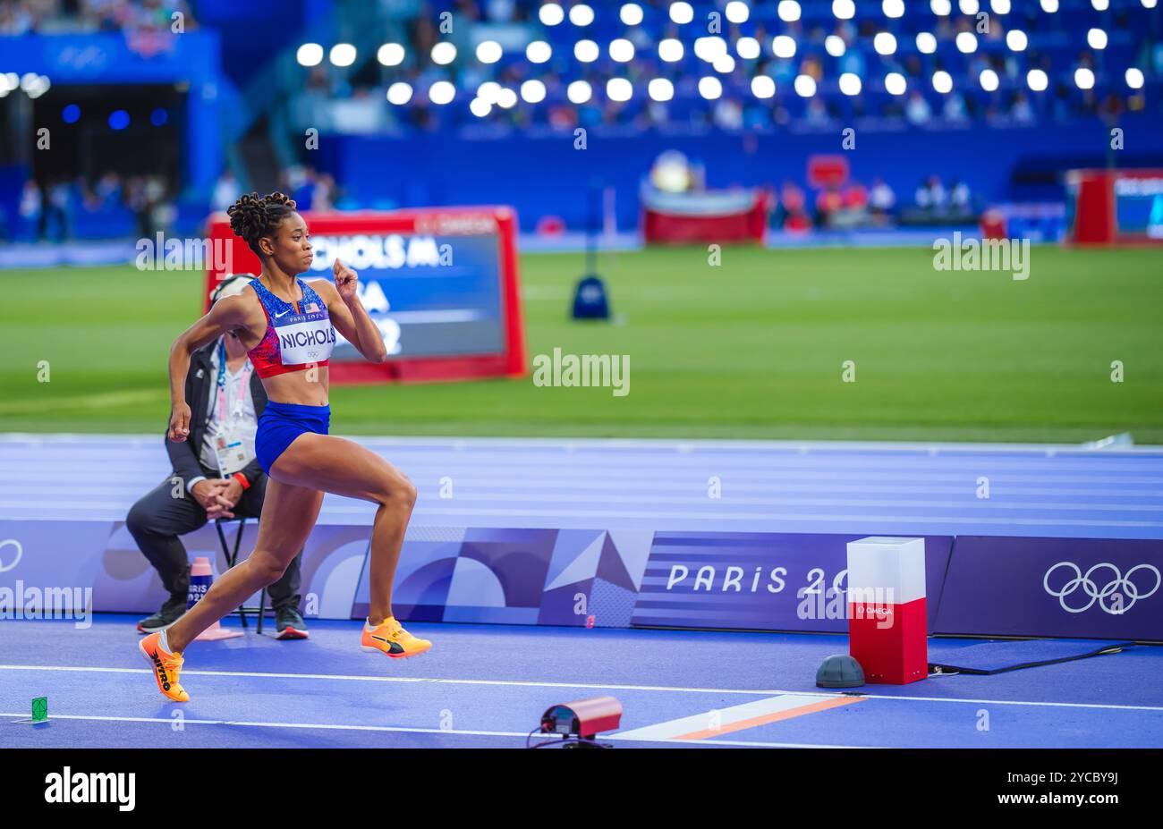 Monae' Nichols participating in the long jump at the Paris 2024 Olympic ...