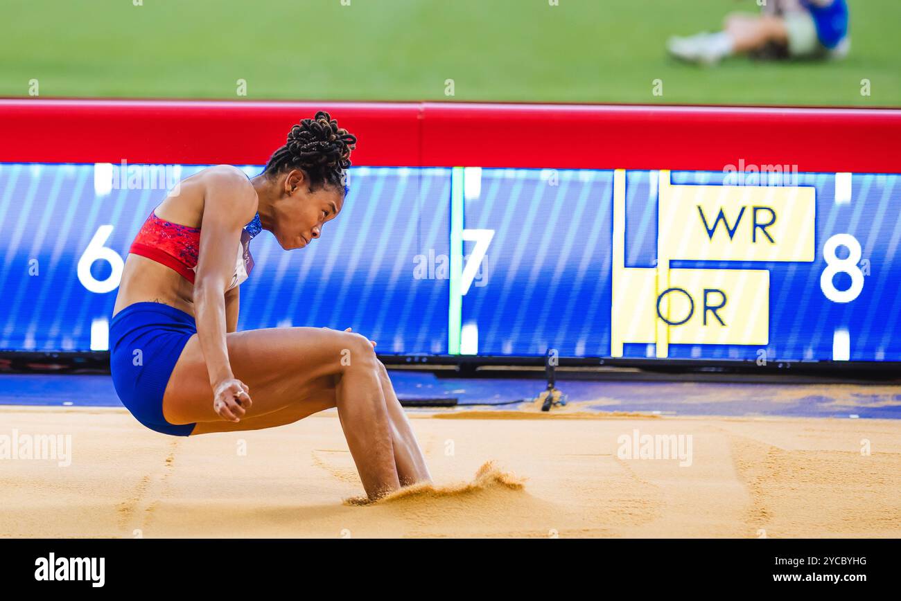 Monae' Nichols participating in the long jump at the Paris 2024 Olympic ...