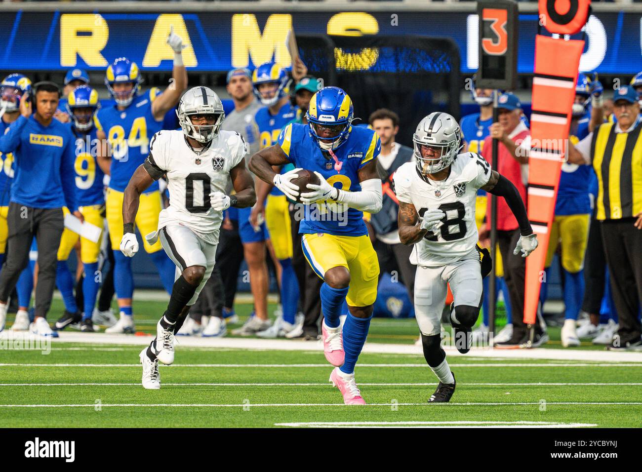 Los Angeles Rams wide receiver Tyler Johnson (18) is chased down by Las ...