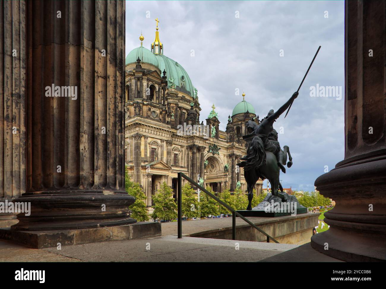 The impressive Berliner Dom stands majestically beyond the columns of ...