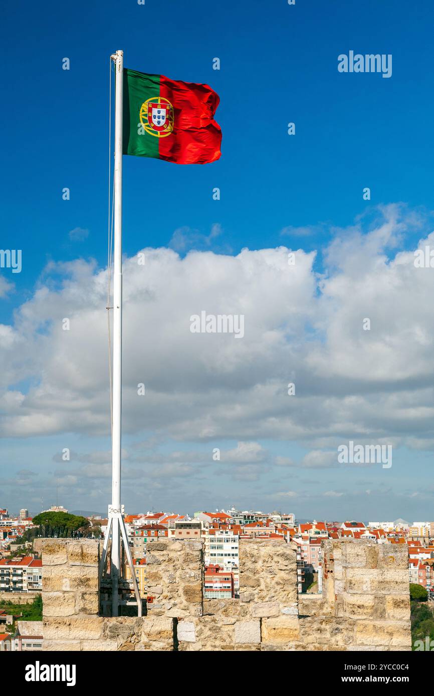 The Portuguese flag flutters above Lisbon, showcasing the city's ...