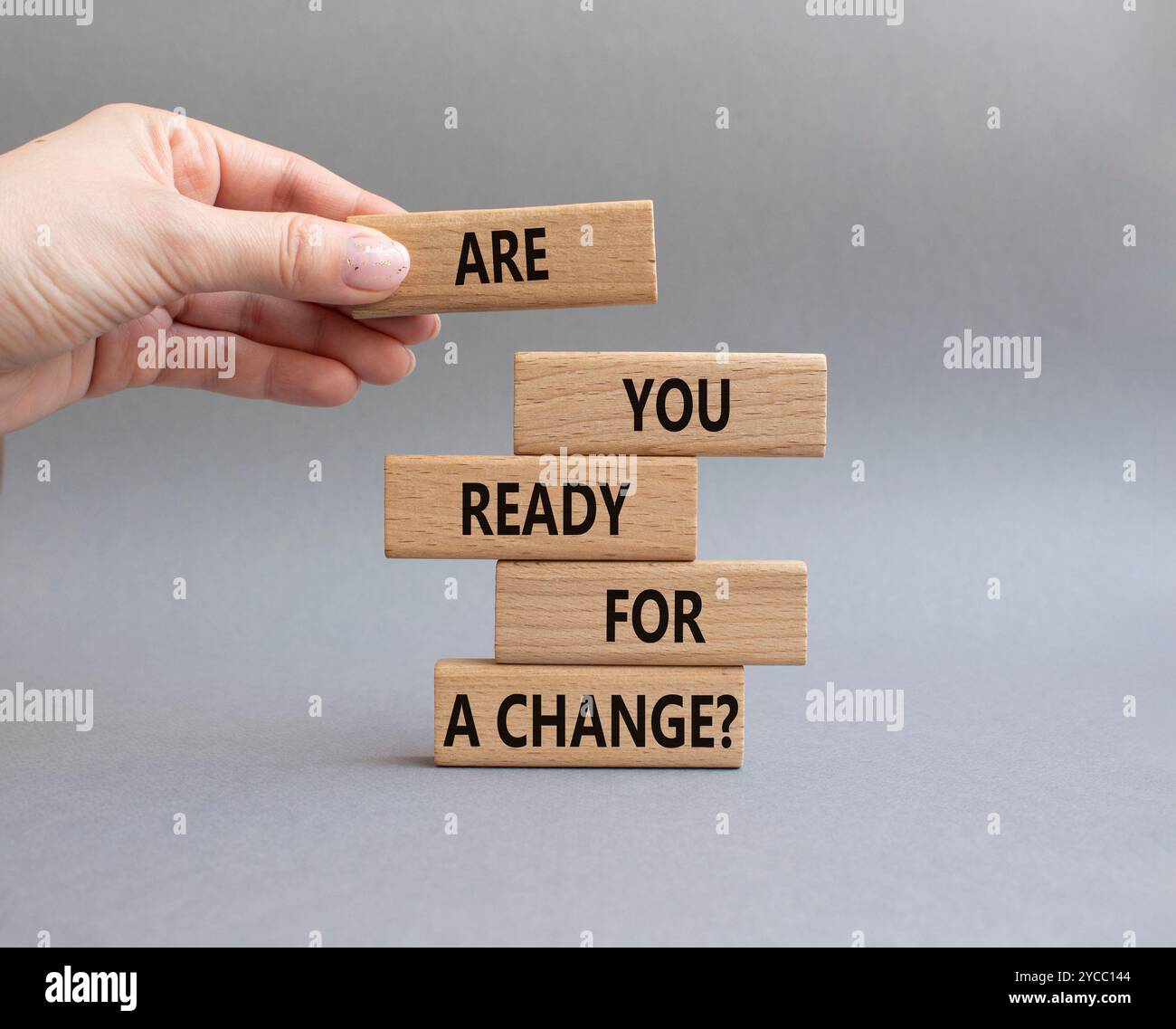 Change symbol. Wooden blocks with words Are you ready for a new change ...