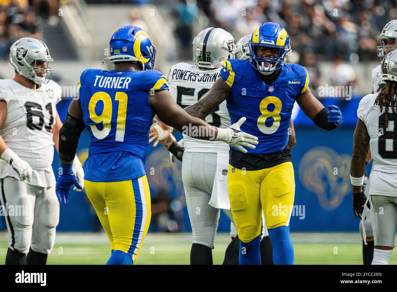 Los Angeles Rams linebacker Jared Verse (8) celebrates with defensive ...