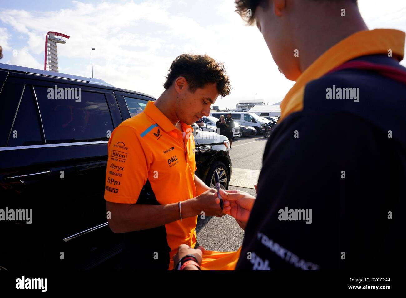 Lando Norris signs autographs during the 2024 United States Grand Prix ...