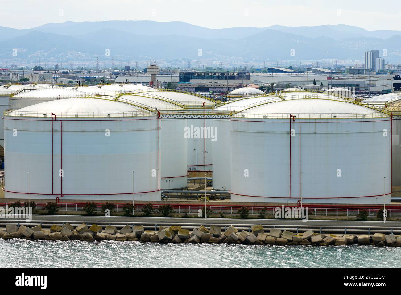 White tanks in tank farm, big silos, tall white metal tanks, multiple ...