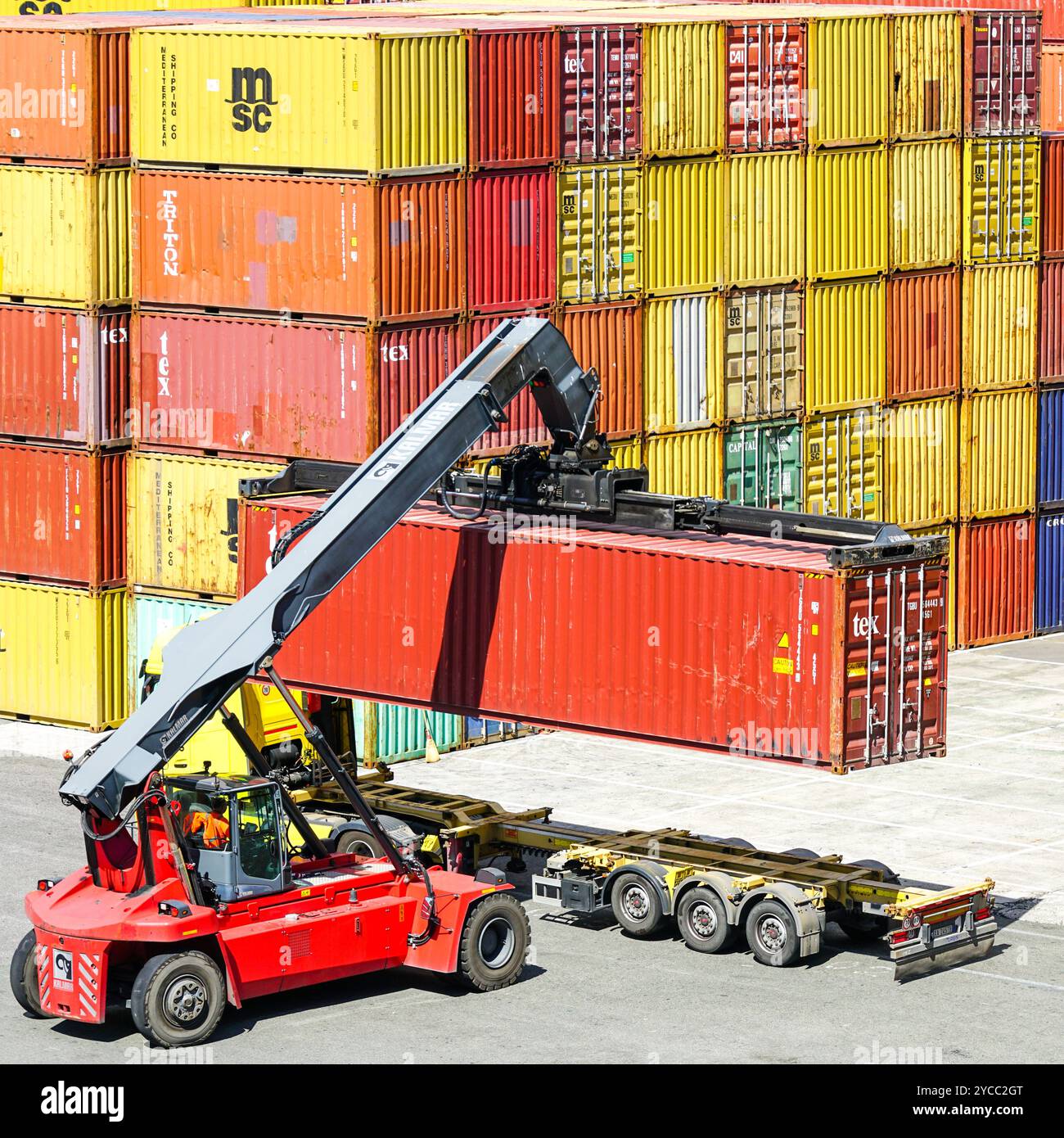 La Spezia, Italy - May 28, 2024: The forklift loads the cargo container ...