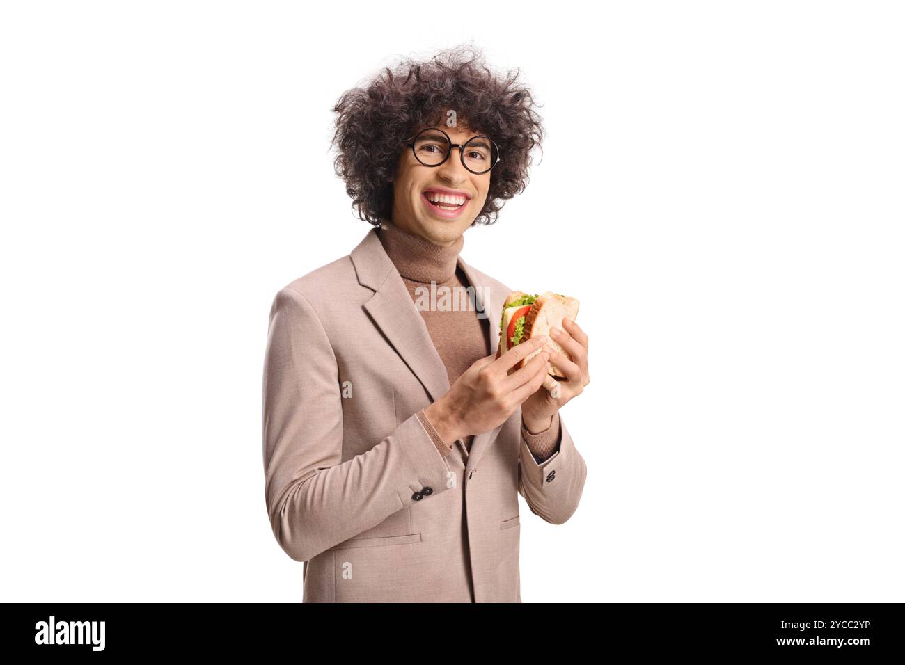 Guy eating a cheese and tomato sandwich isolated on white background ...