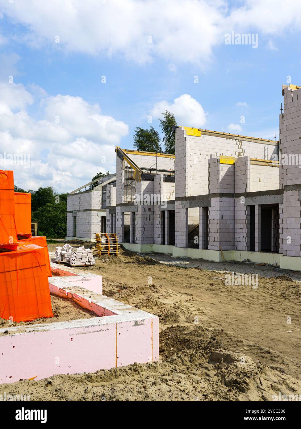 Construction of a new residential terraced house from expanded clay ...