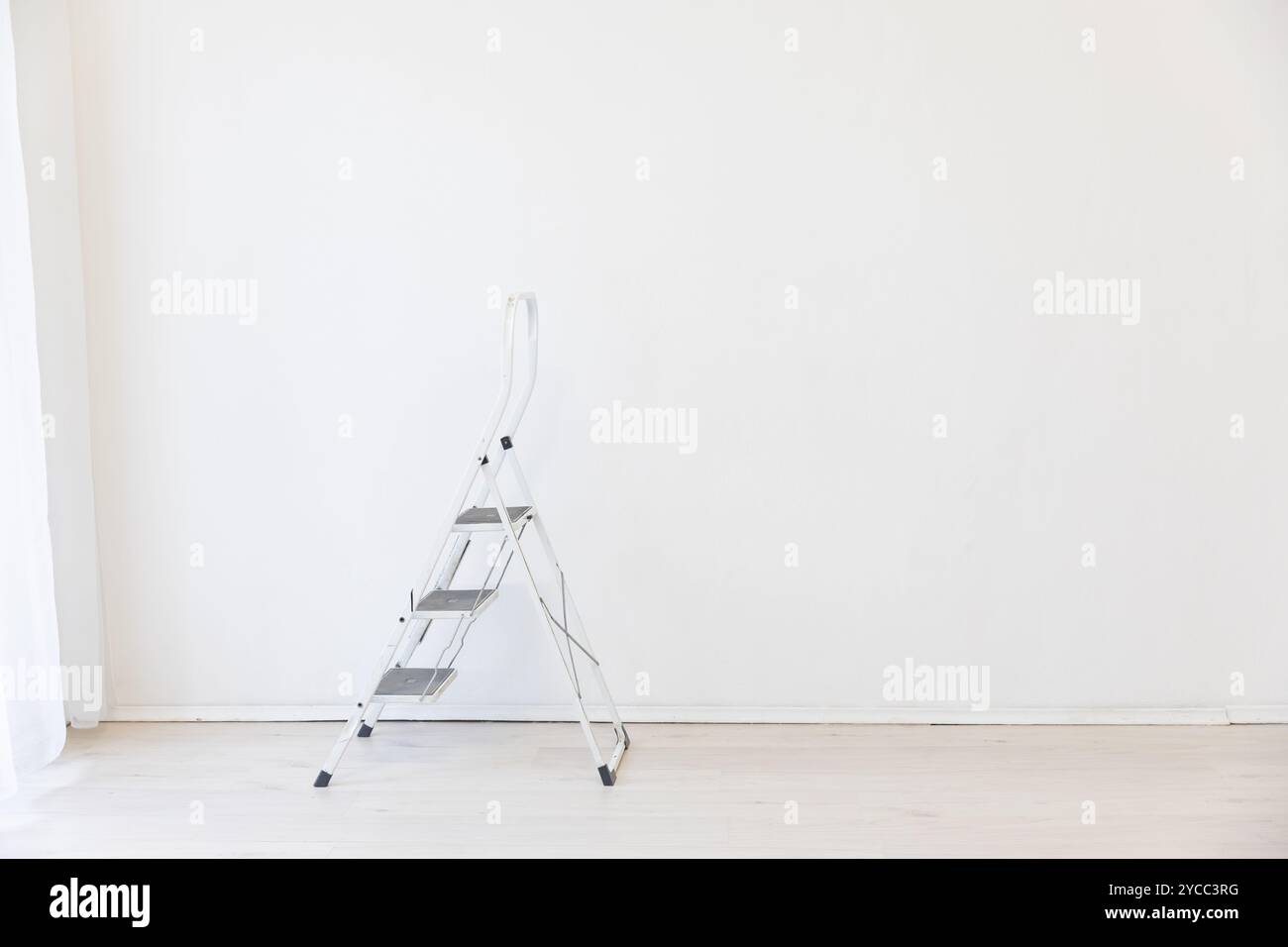 ladder for renovation in the interior of an empty white room Stock ...