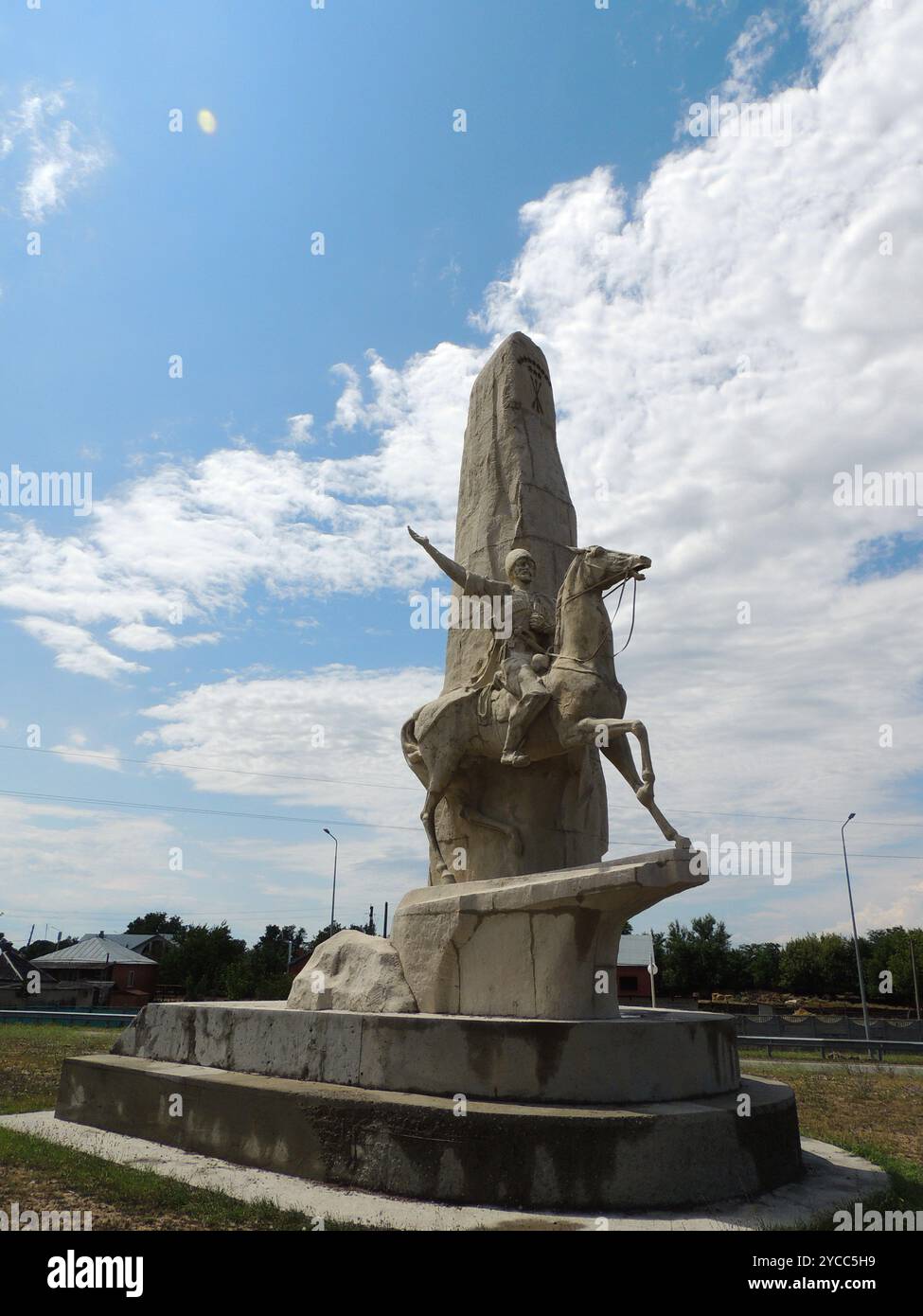 stone monument to a Circassian warrior in Adygea, vertical photo, white ...