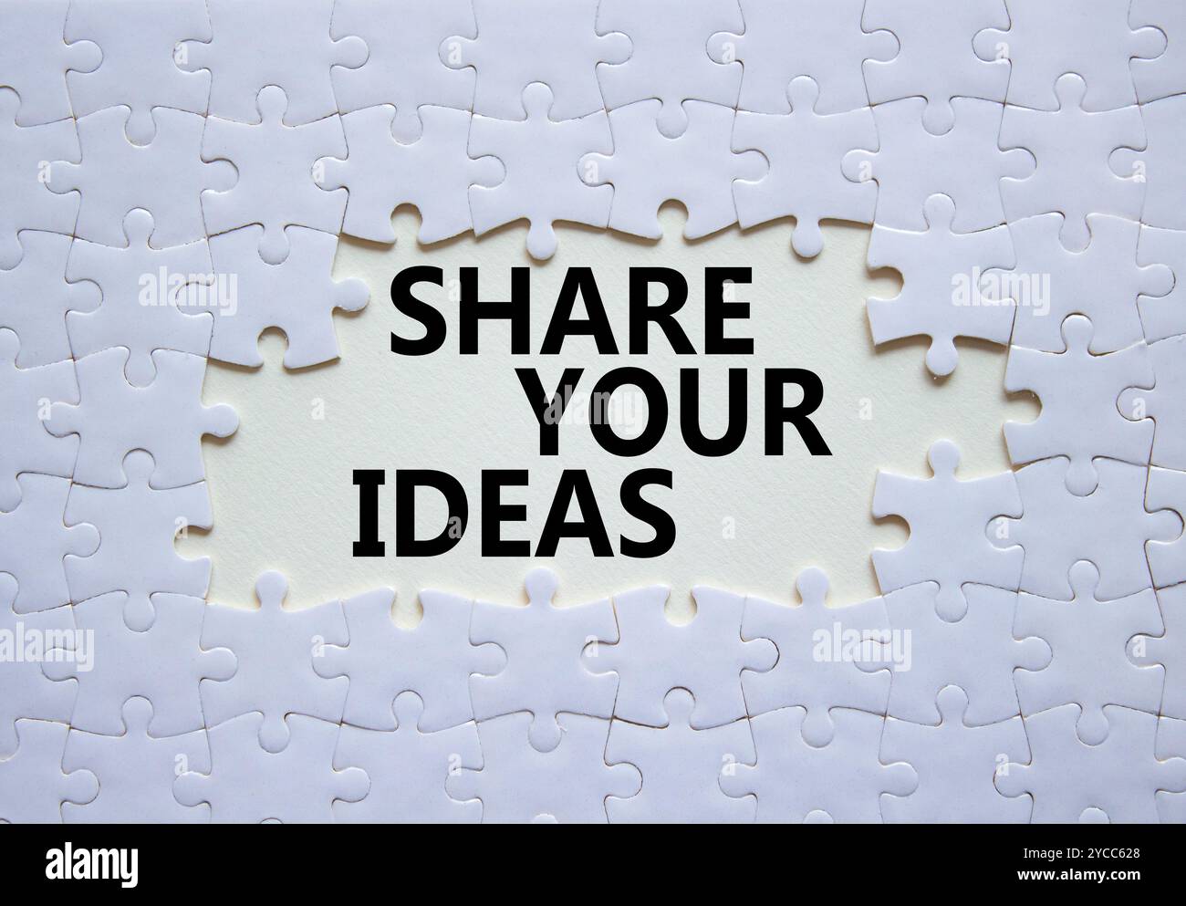 Share your Ideas symbol. Concept words Share your Ideas on white puzzle ...