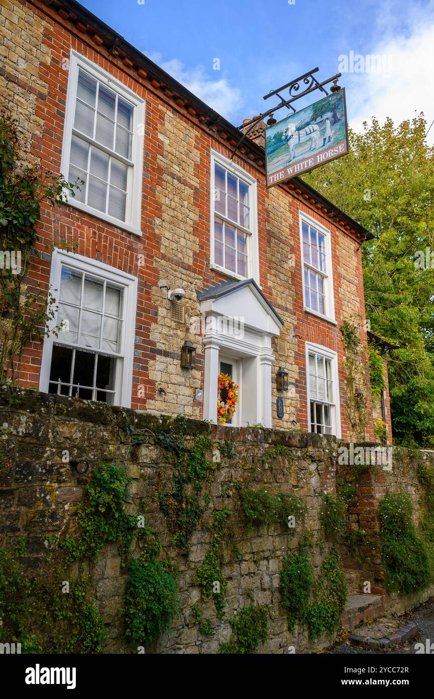 The pretty White Horse pub in Sutton village in West Sussex, England ...