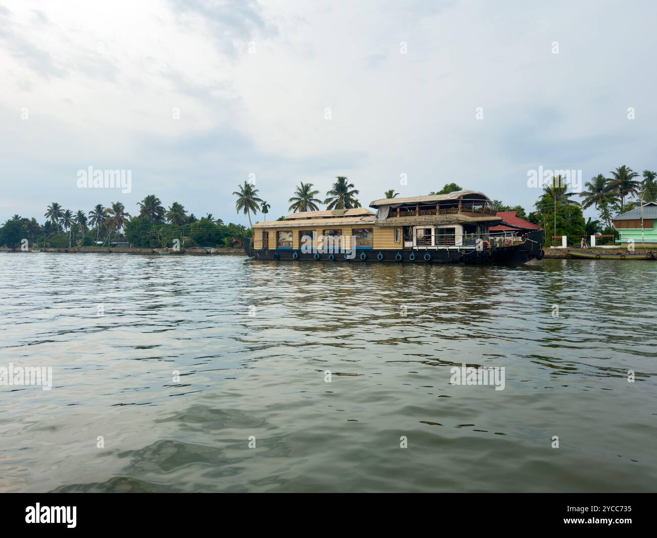 Houseboat ruising along the Alappuzha backwaters in the indian state of ...