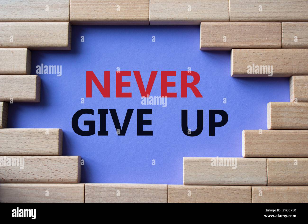 Never give up symbol. Concept words Never give up on wooden blocks ...