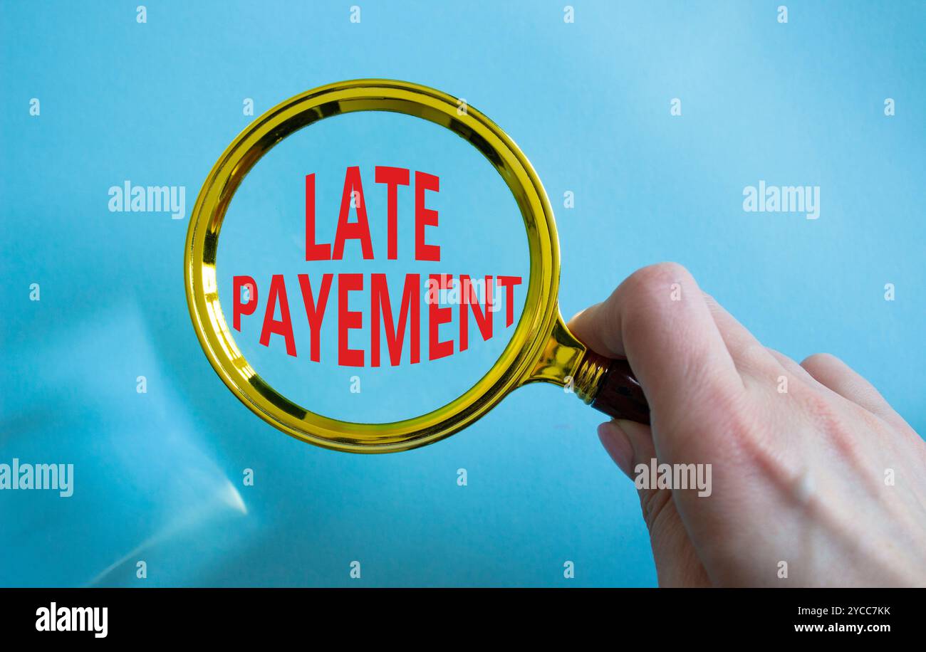 Late payment symbol. Concept word Late payment on magnifying glass ...