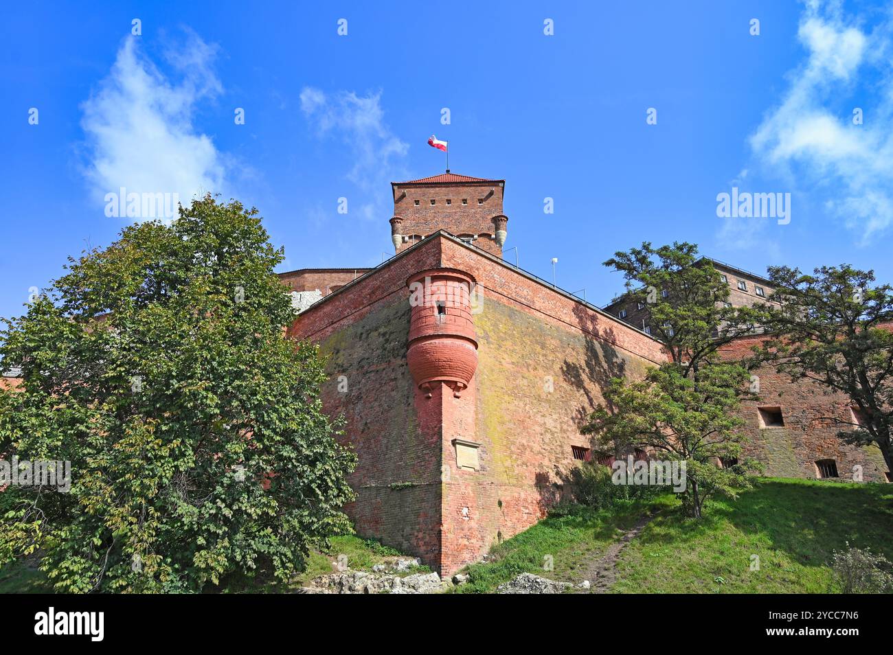 Wawel castle tower with the Polish flag in Krakow Stock Photo - Alamy
