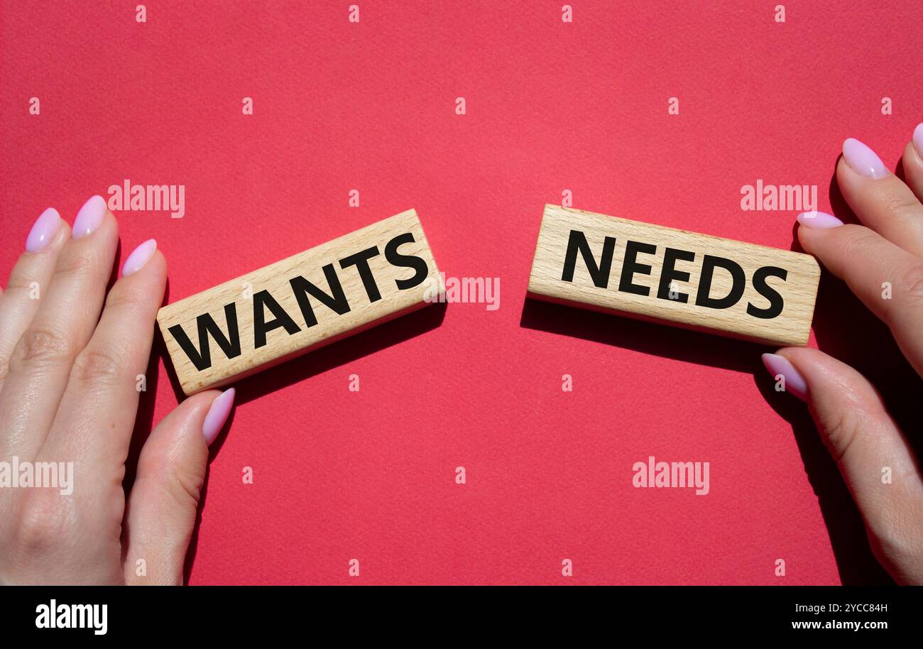 Wants and Needs symbol. Concept word Wants and Needs on wooden blocks ... Wants and Needs symbol. Concept word Wants and Needs on wooden blocks ...